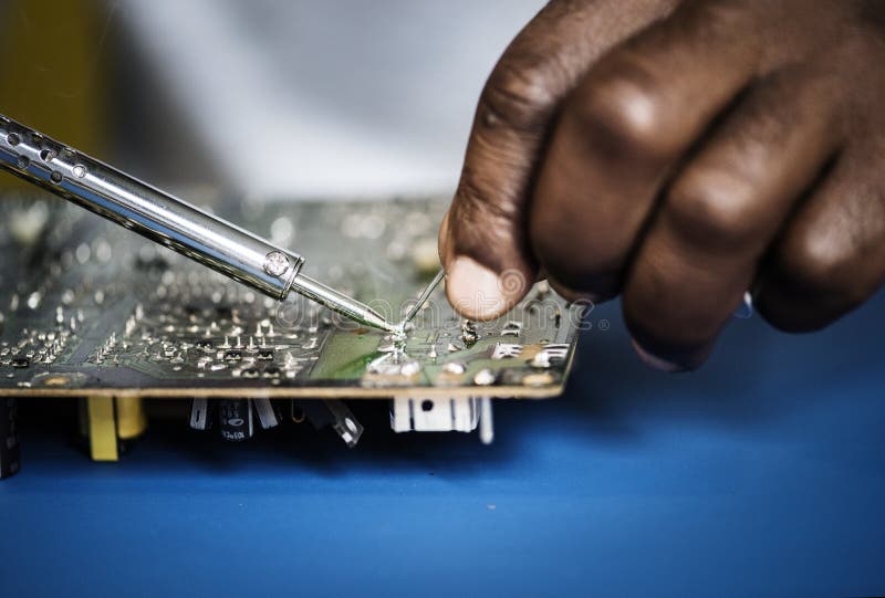 Closeup of Tin Soldering with Electronics Circuit Board Stock Photo ...