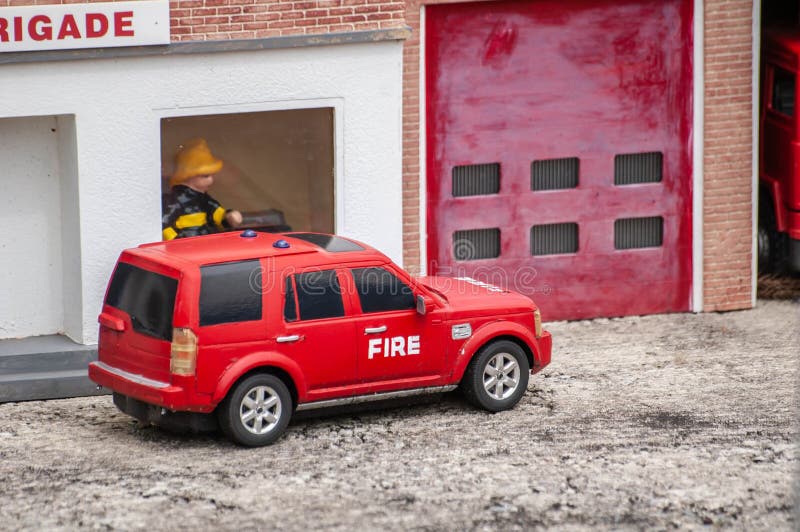 Closeup of Tiny Model Fireman Stock Image - Image of figures, fire ...