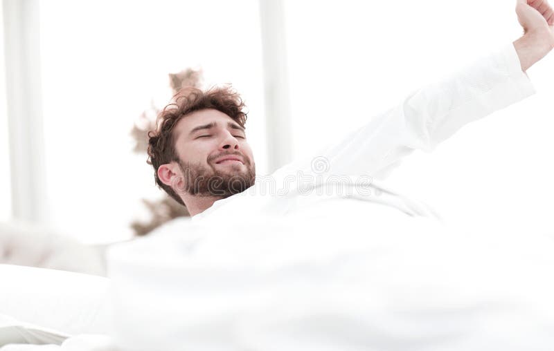 Closeup.tired Men Asleep on the Bed Stock Image - Image of attractive ...