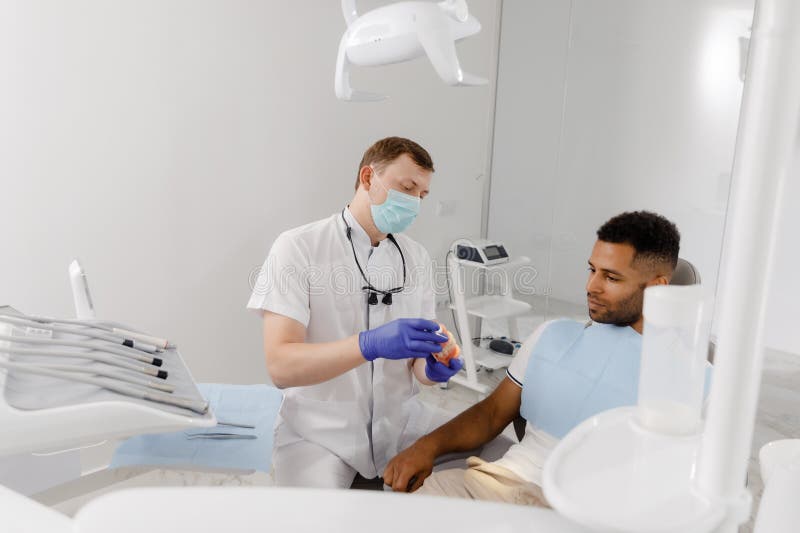 Closeup To the Camera Good Looking Dentist with Protective Mask ...