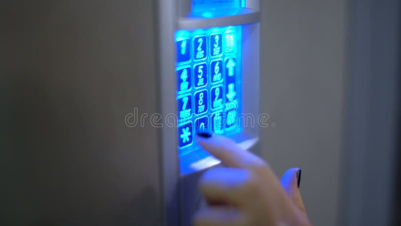 CloseUp To Intercom Entry System while Hand is Entering a Code To Open ...
