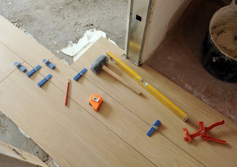 Special Tools for Placing a Porcelain Stoneware Tile Floor. Stock Image ...