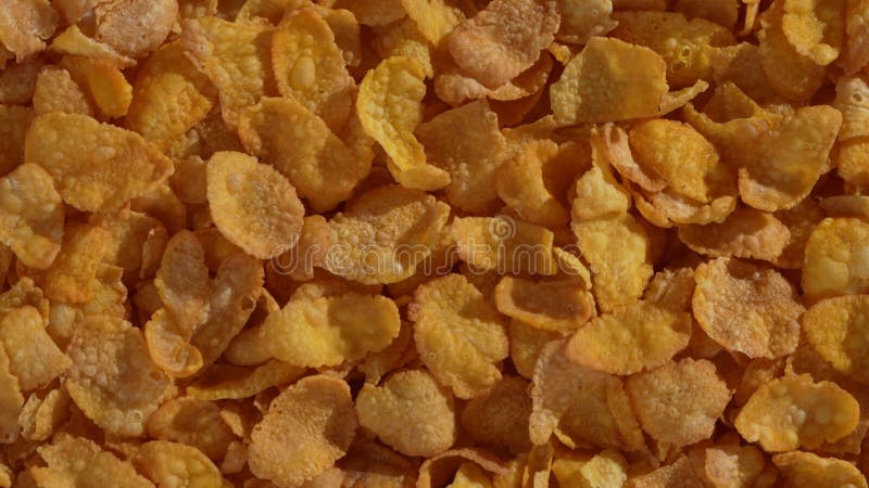 Closeup Top View of a Spinning Pile of Corn Flakes with Clear Dry ...