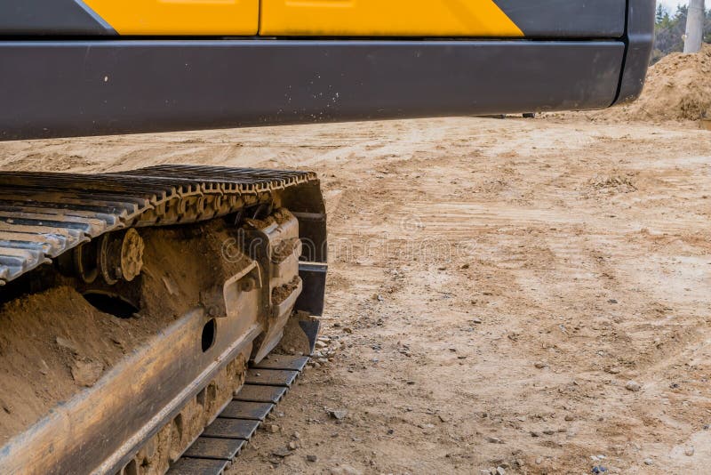 Track assembly of backhoe stock image. Image of people - 171161739