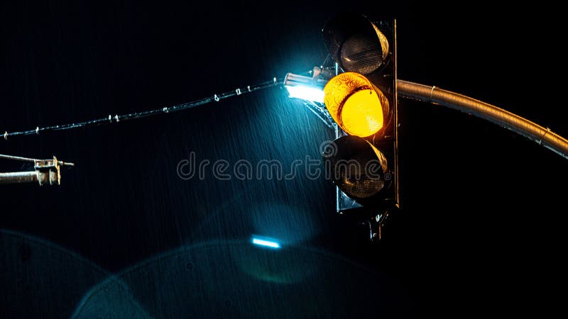 Closeup of a Traffic Light Under the Rain at Night Stock Image - Image ...