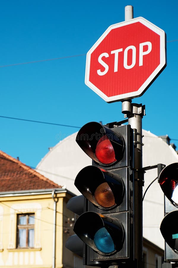 Closeup of Traffic Lights and Stop Sign at Intersection Stock Photo ...