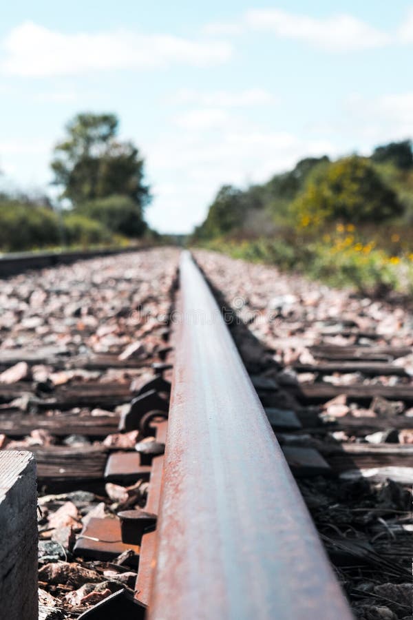 Closeup on a train rails stock photo. Image of long - 126960138