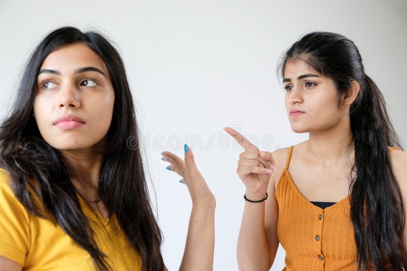 Closeup of Two Girls Arguing with Each Other. Stock Image - Image of ...