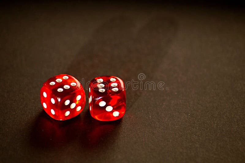 Closeup of Two Red Dice on a Brown Surface- Concept of Winning Stock ...