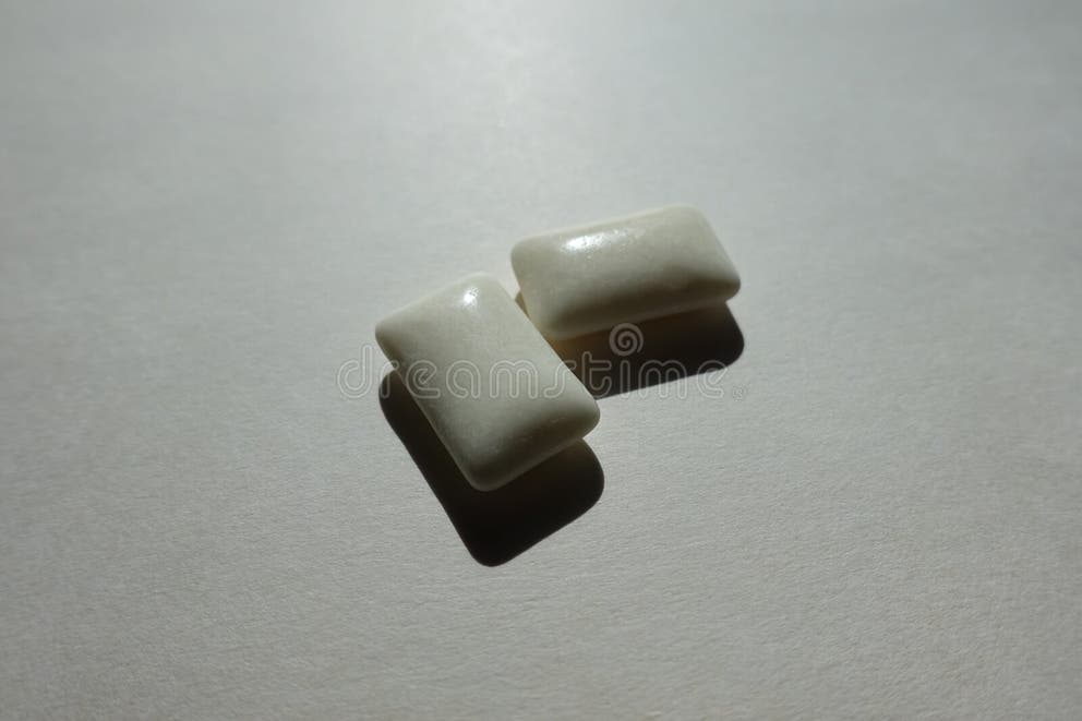 Closeup of Two White Pieces of Chewing Gum Stock Image - Image of ...