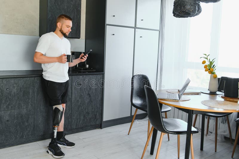Unrecognizable Man with Bionic Prosthetic Leg at Home Indoors, Copy ...