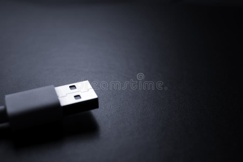 Closeup of USB Cable. Isolated on Black Background Stock Image - Image ...