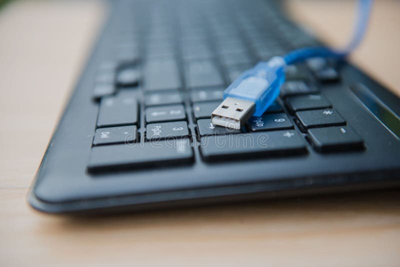 Closeup USB Cable on Keyboard . Technology Concept Stock Image - Image ...