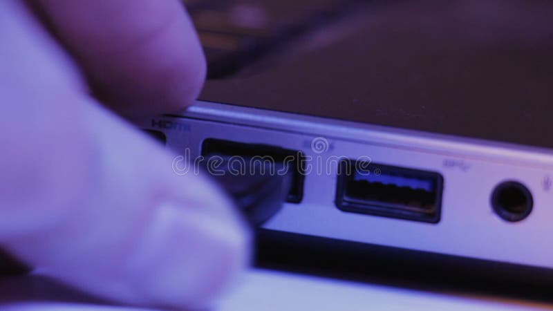 Closeup of USB Flash Drive Inserted into Port on the Side of a L Stock ...