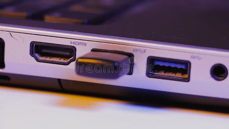 Closeup of USB Flash Drive Inserted into Port on the Side of a L Stock ...