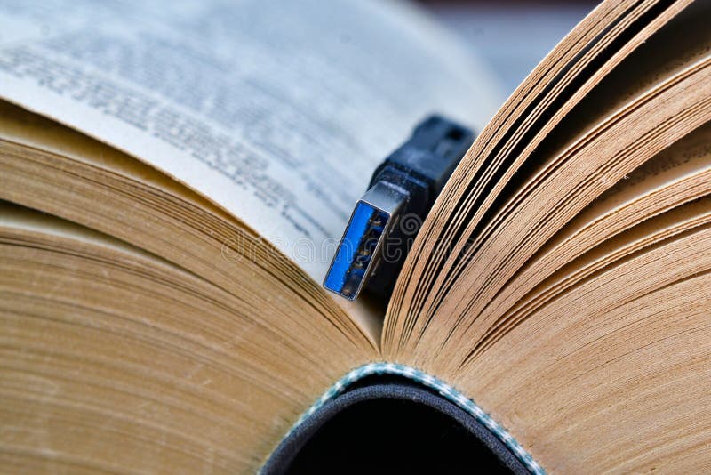 Closeup of a USB Port Inside Pages of a Book Stock Image - Image of ...