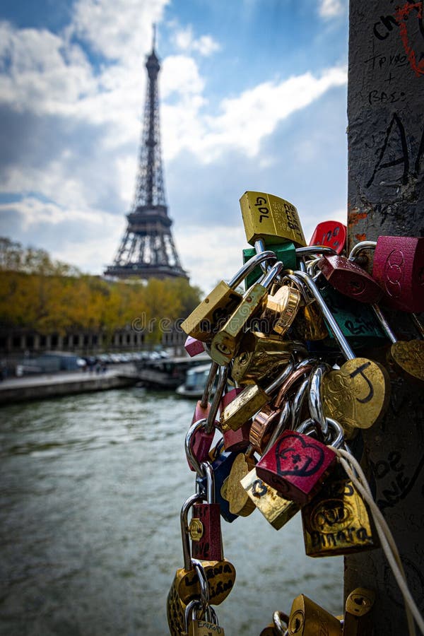 Closeup of a Variety of Locks with the Eiffel Tower in the Background ...