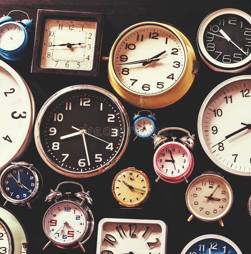 Closeup of Various Clocks Isolated on Black Stock Image - Image of ...
