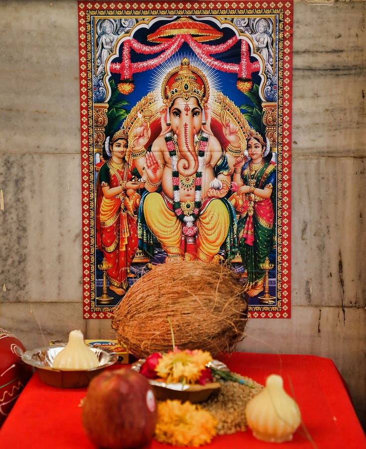 Closeup Vertical Shot of the God Ganesha Wallpaper on the Wall with a ...