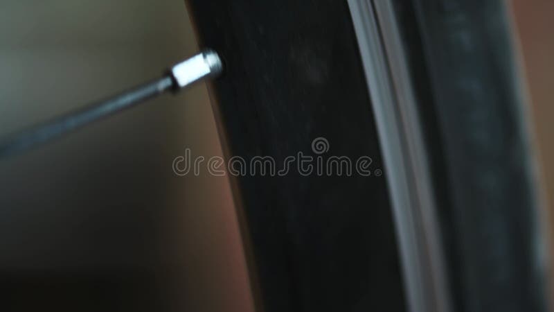 In a Close-up Video, the Spinning Bicycle Tire is Captured in ...