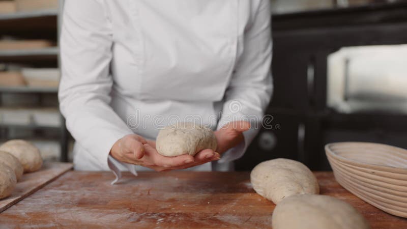 Closeup View on Baker Hands Preparing Formed Bread Dough for Proofing ...