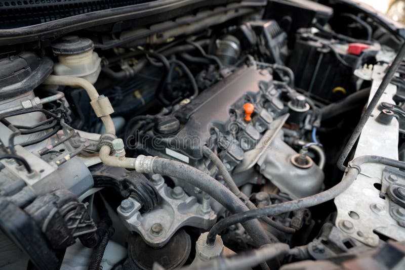 Closeup View of a Car Engine with Various Component and Wire Visible ...