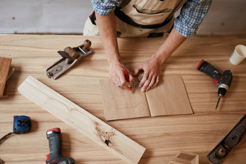 Carpenter Using Ruler To Draw Line Marking Stock Photos - Free ...