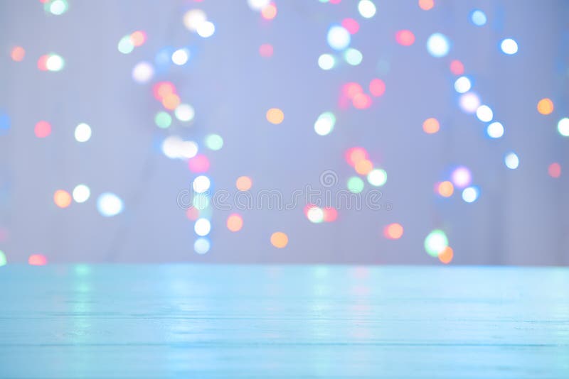 Closeup View of Color Wooden Table with Glowing Lights Stock Image ...