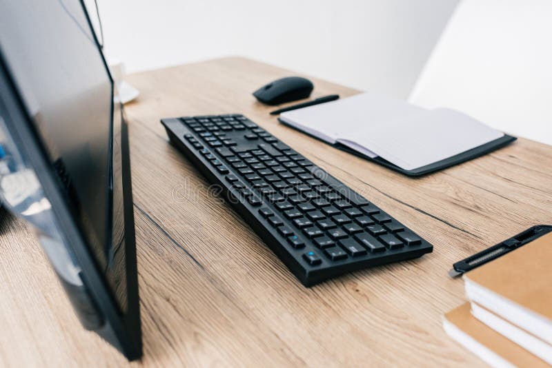 Closeup View of Computer Keyboard and Mouse, Textbooks and Pens Stock ...