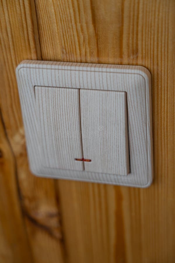 Double Button Light Switch on Brown Wooden Wall Stock Image - Image of ...