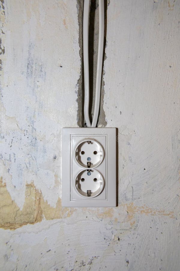 Closeup View of a Double Electrical Outlet on a Wall Stock Image ...