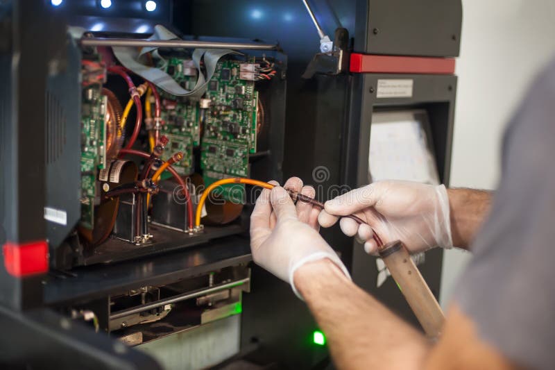 Closeup View of Electrical Engineer Operator Repairs Industrial Printer ...