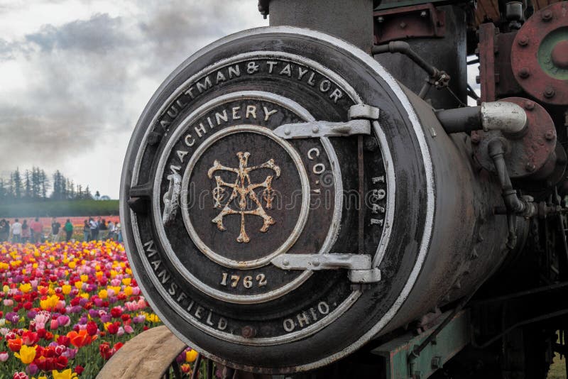 Up Close View of a Front Part of a Steam Engine with Engraving on it ...