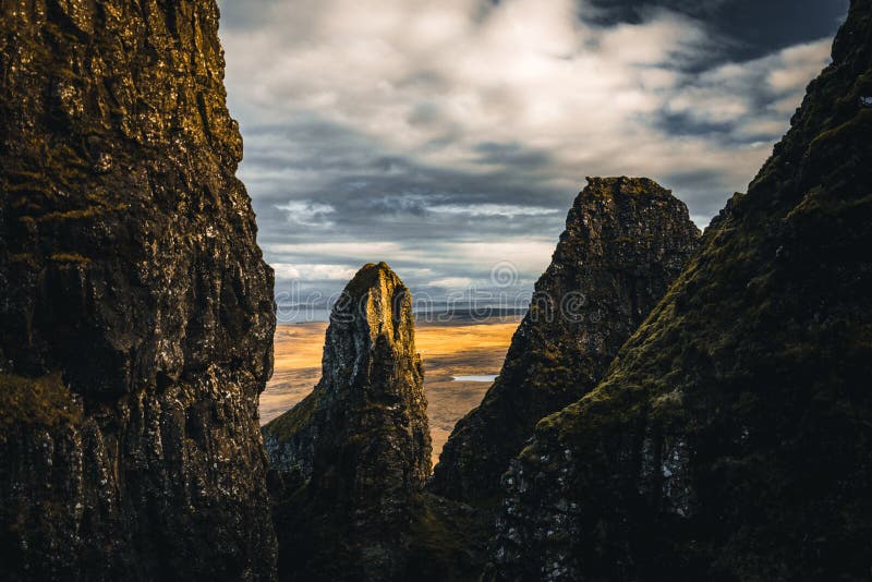 Closeup View of High Thick Cliffs at the Field Under a Cloudy Sky Stock ...