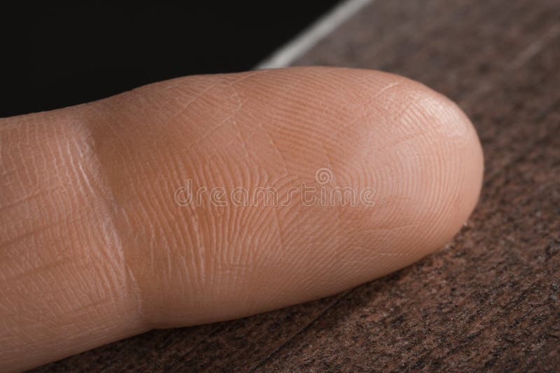 Closeup View of Human Finger on Wooden Surface Stock Image - Image of ...