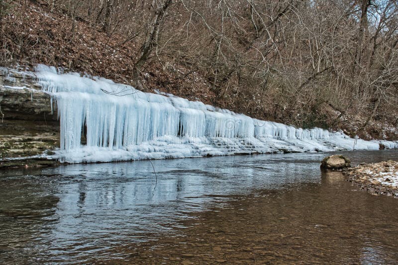 Closeup View of a Iced Waterfall Next To the Forest Stock Image - Image ...