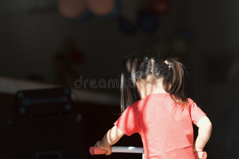 Closeup View of a Little Girl from Backward Stock Photo - Image of ...