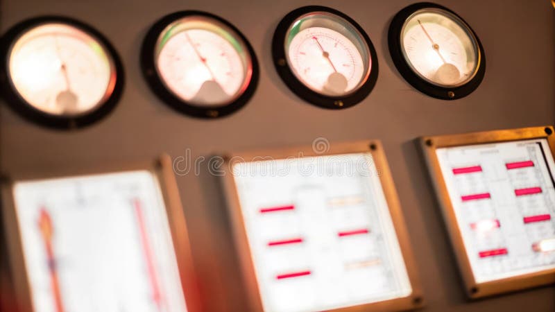 A Closeup View of a Machine Dashboard with Illuminated Indicators and ...