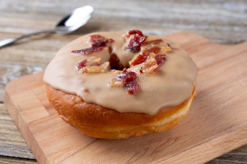 Maple bacon donut stock photo. Image of donut, shelf - 281905378