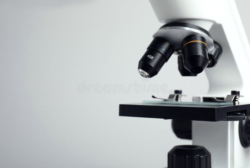 Closeup View of Modern Microscope on Grey, Space for Text. Medical ...