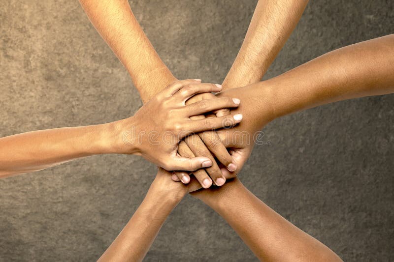 Closeup View of People Stacking Their Hands Together for Unity and ...