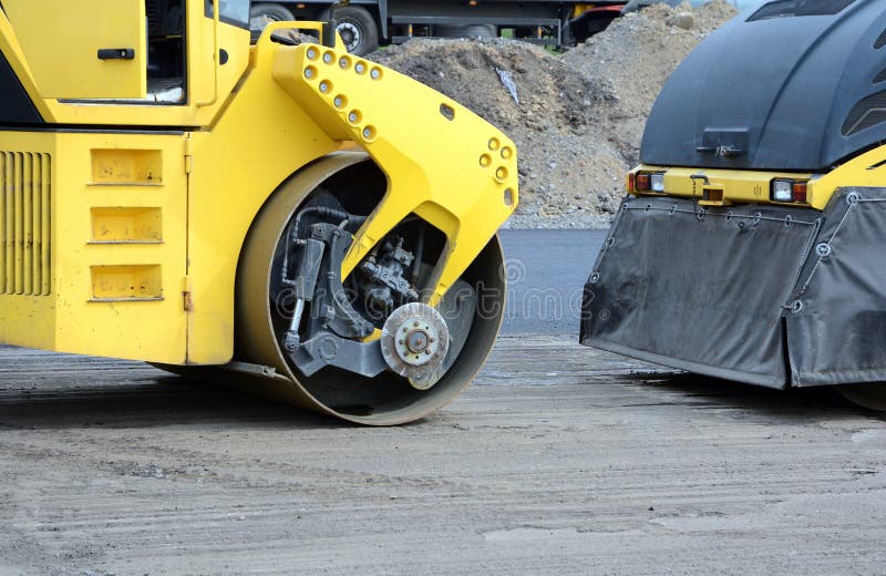 Closeup View on the Road Roller Working on the New Road Construction ...