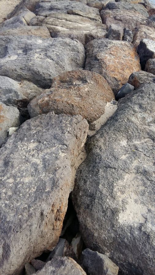 Closeup View of Rocks at Seaside Stock Image - Image of coast, hard ...