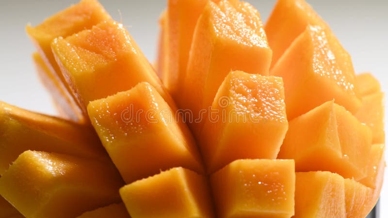 Closeup View of Rotating Sliced Mango Fruit Stock Video - Video of ...