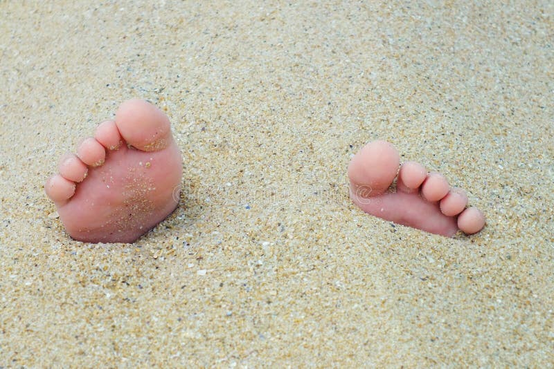 Closeup View of Small Feet with Toes in the Sand Lit by the Sunset ...