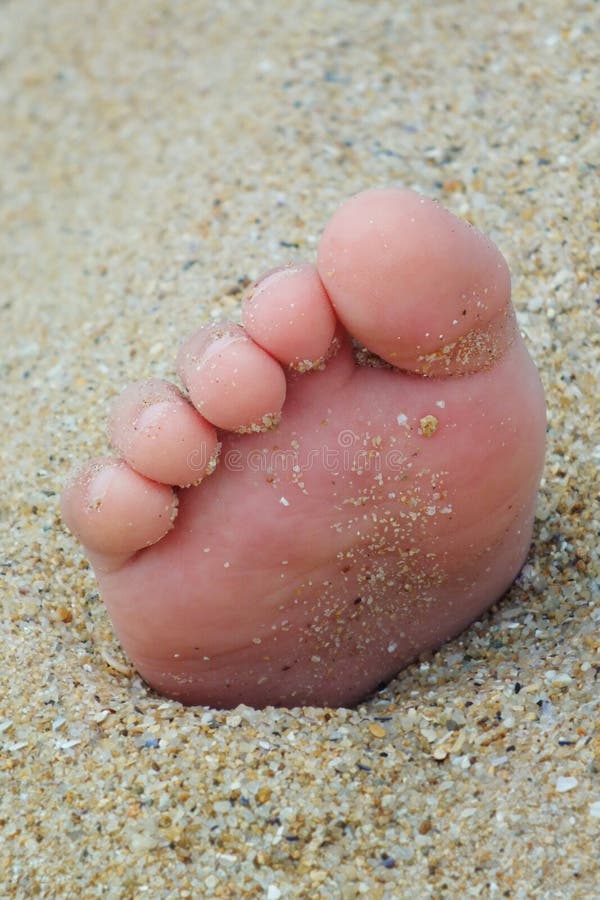 Closeup View of Small Feet with Toes in the Sand Lit by the Sunset ...