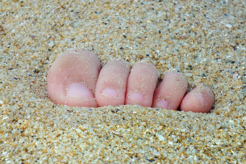 Closeup View of Small Feet with Toes in the Sand Lit by the Sunset ...