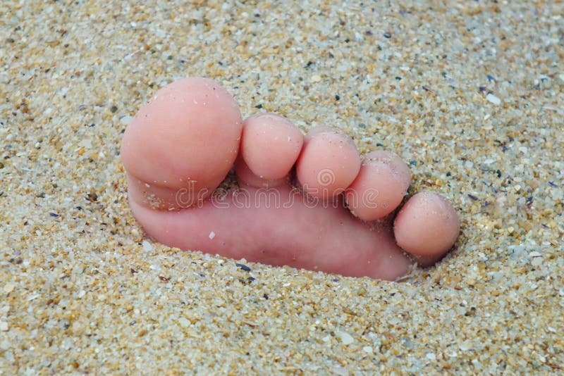Closeup View of Small Feet with Toes in the Sand Lit by the Sunset ...