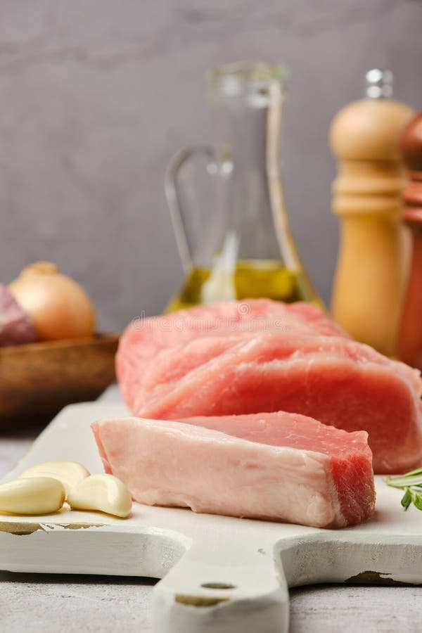 Closeup View of Uncooked Raw Pork Fillet Cut on Slices Stock Photo ...