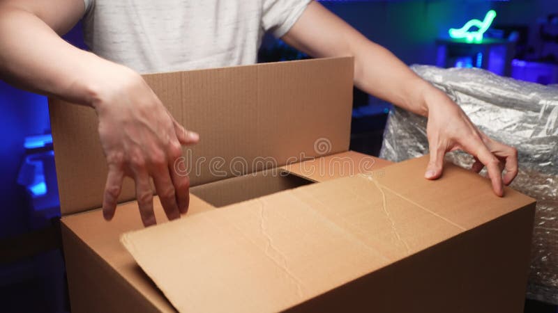 Closeup View of Unrecognizable Man Assembling Cardboard Box for ...